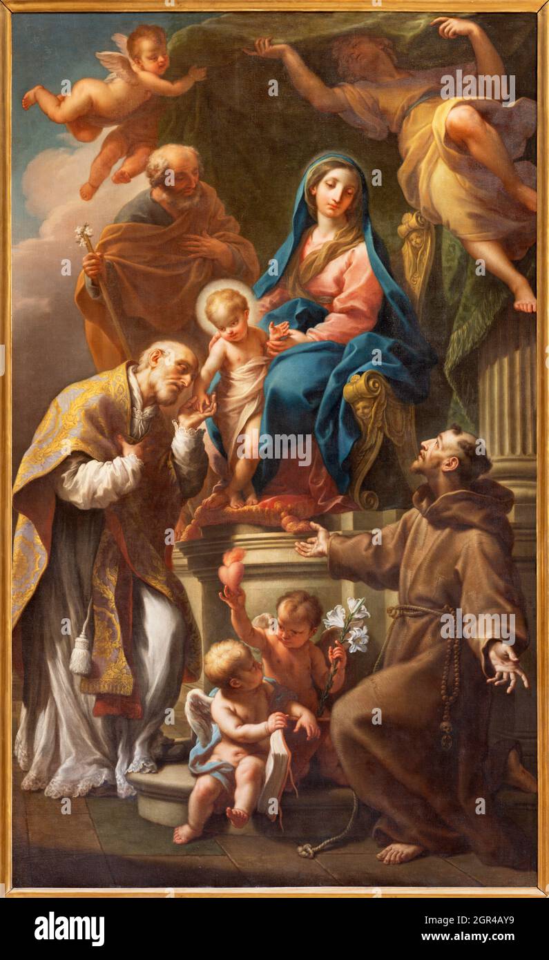ROME, ITALY - AUGUST 31, 2021: The painting of Holy Family with St ...