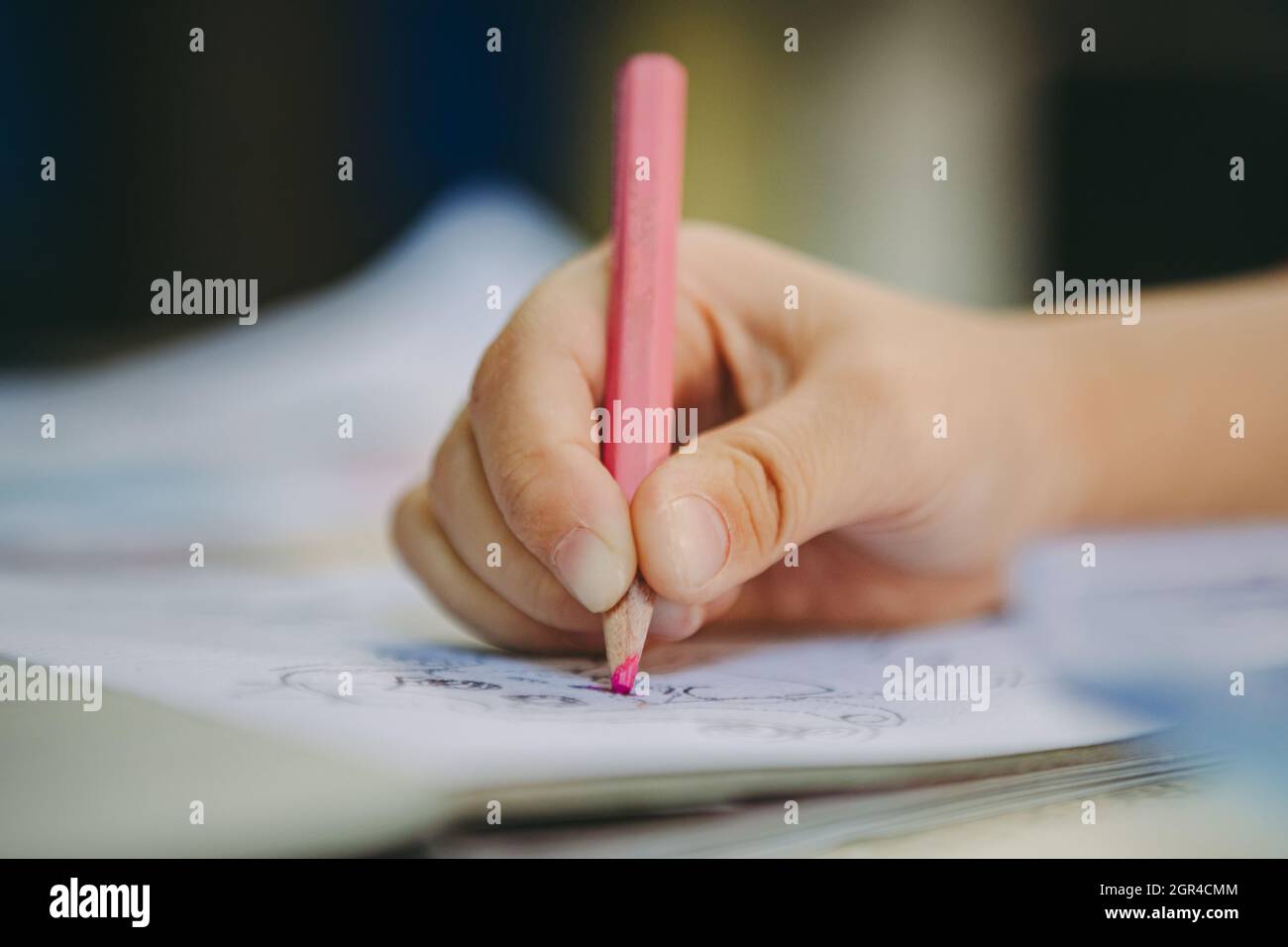 Hand holding crayon coloring hi-res stock photography and images - Alamy