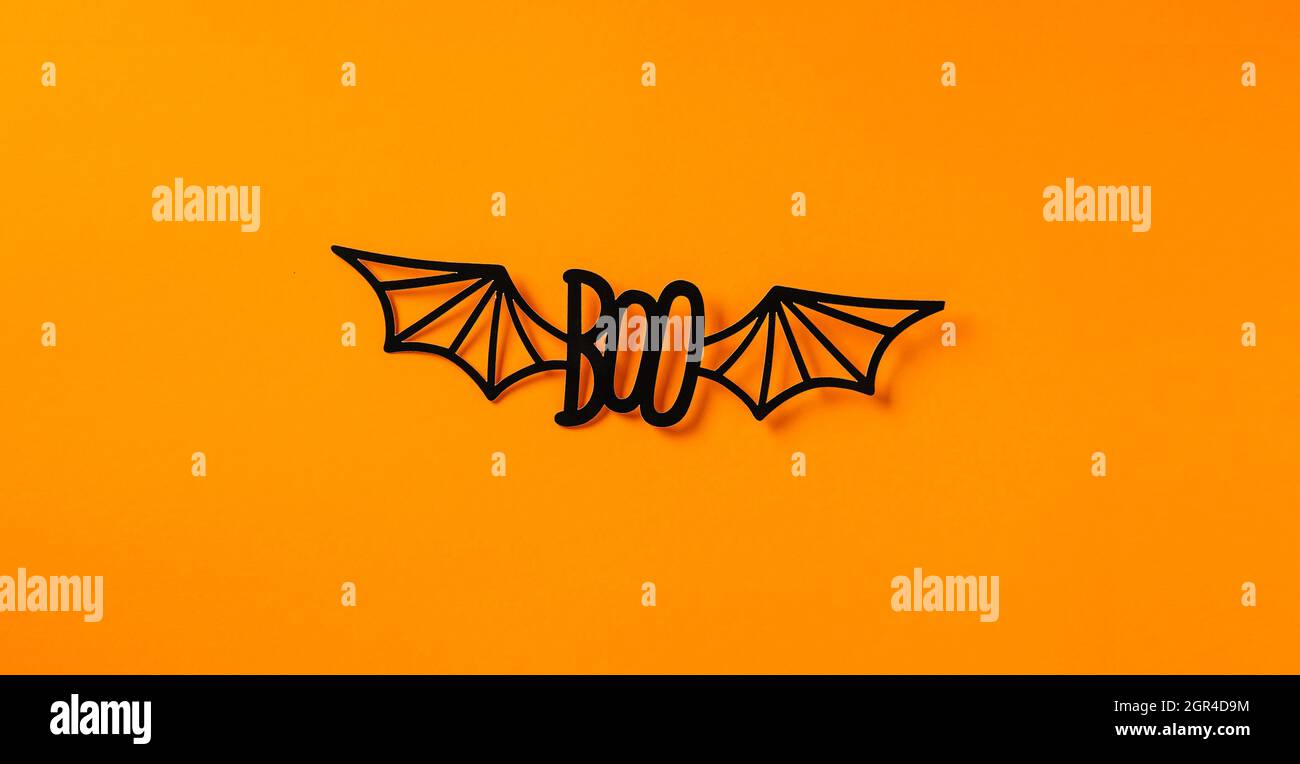 Creative Boo word phrase message text with bat wings on orange ...