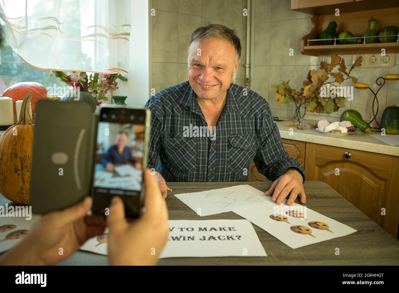 How to make Jack O'Lantern at home? Women's hands photograph the making ...
