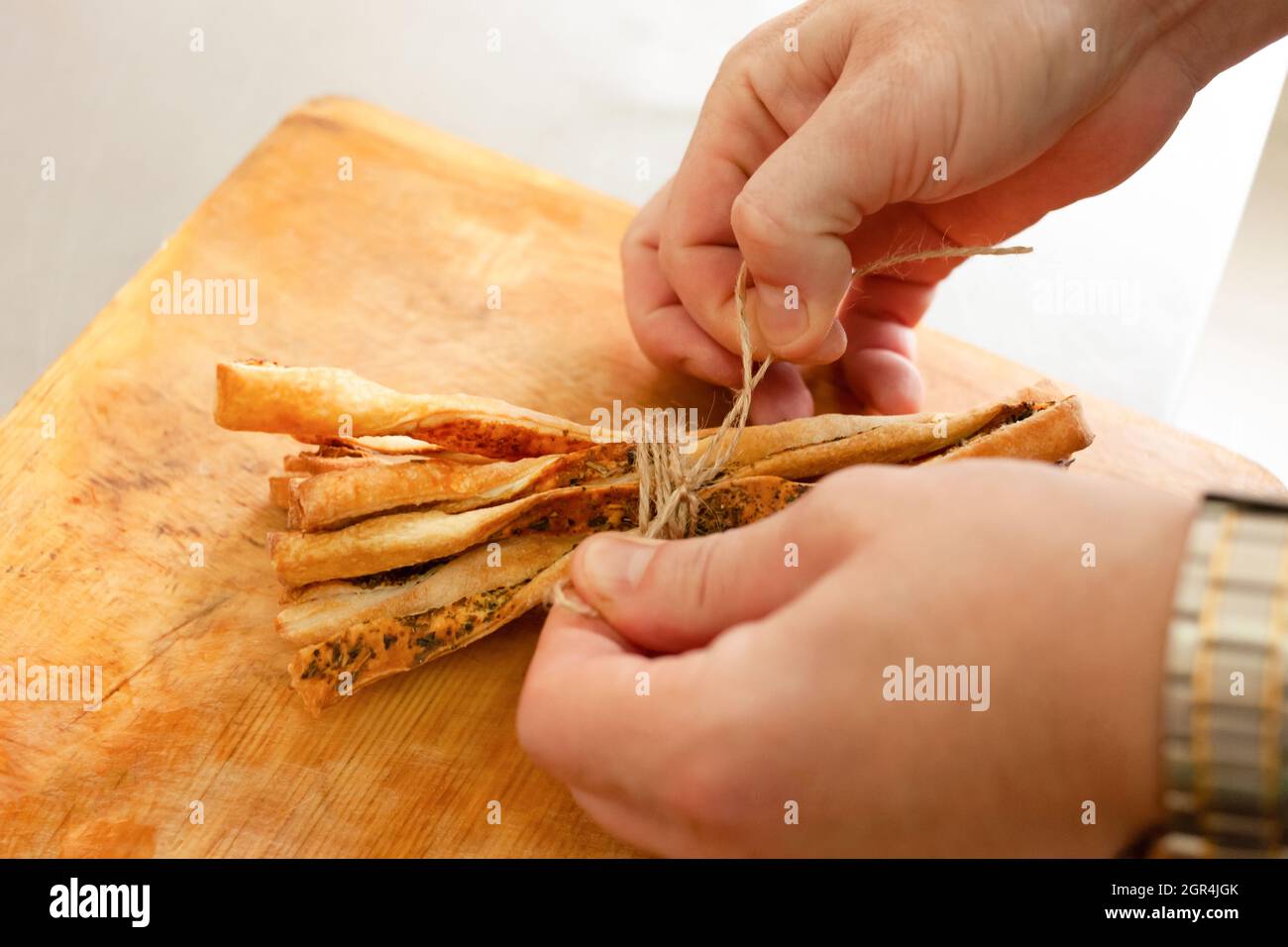 Man eating bread stick hi-res stock photography and images - Alamy