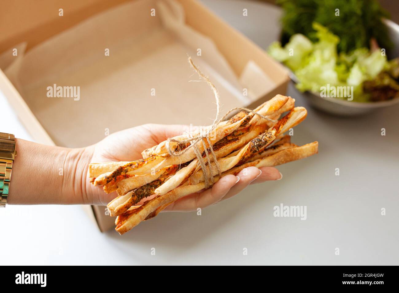 Man eating bread stick hi-res stock photography and images - Alamy
