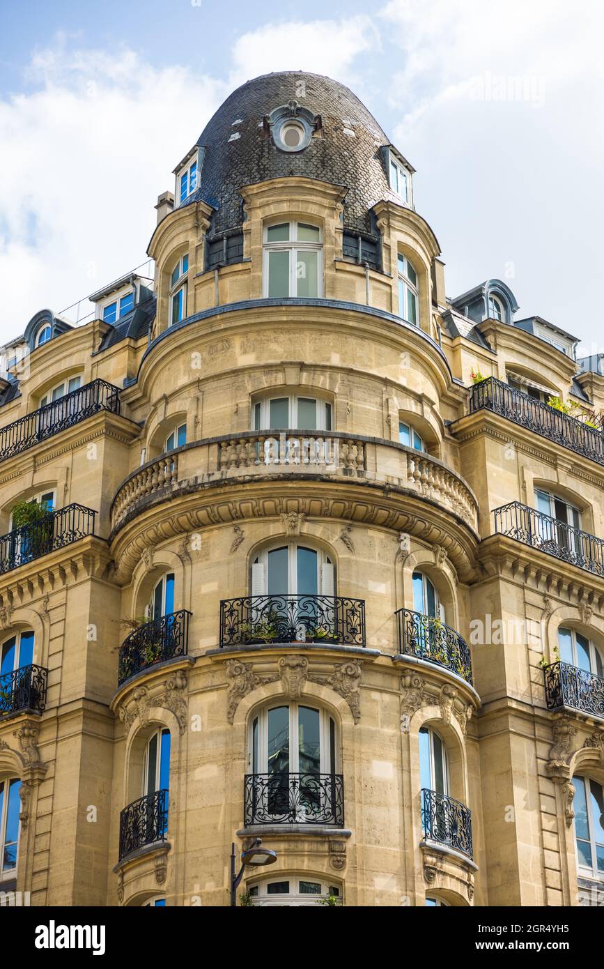 Vertical shot of a beautiful residential building with balconies in ...