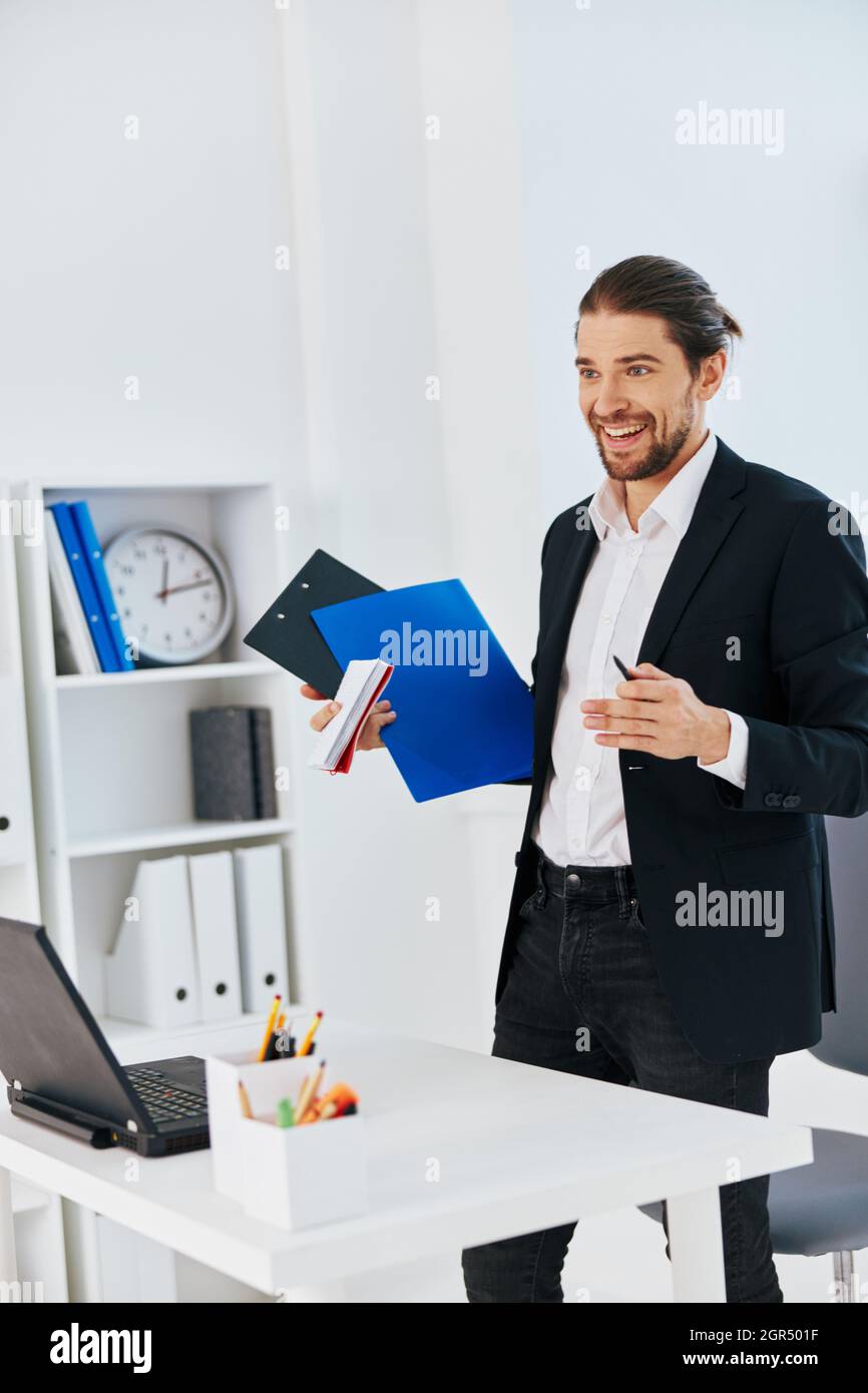 Man workflow in the office documents emotions technology Stock Photo ...