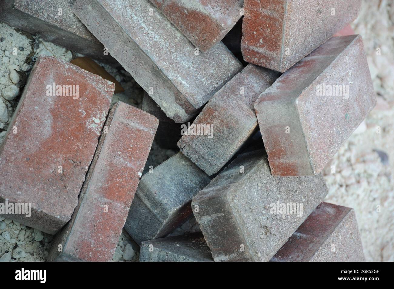 Pile of dusty bricks for construction Stock Photo - Alamy