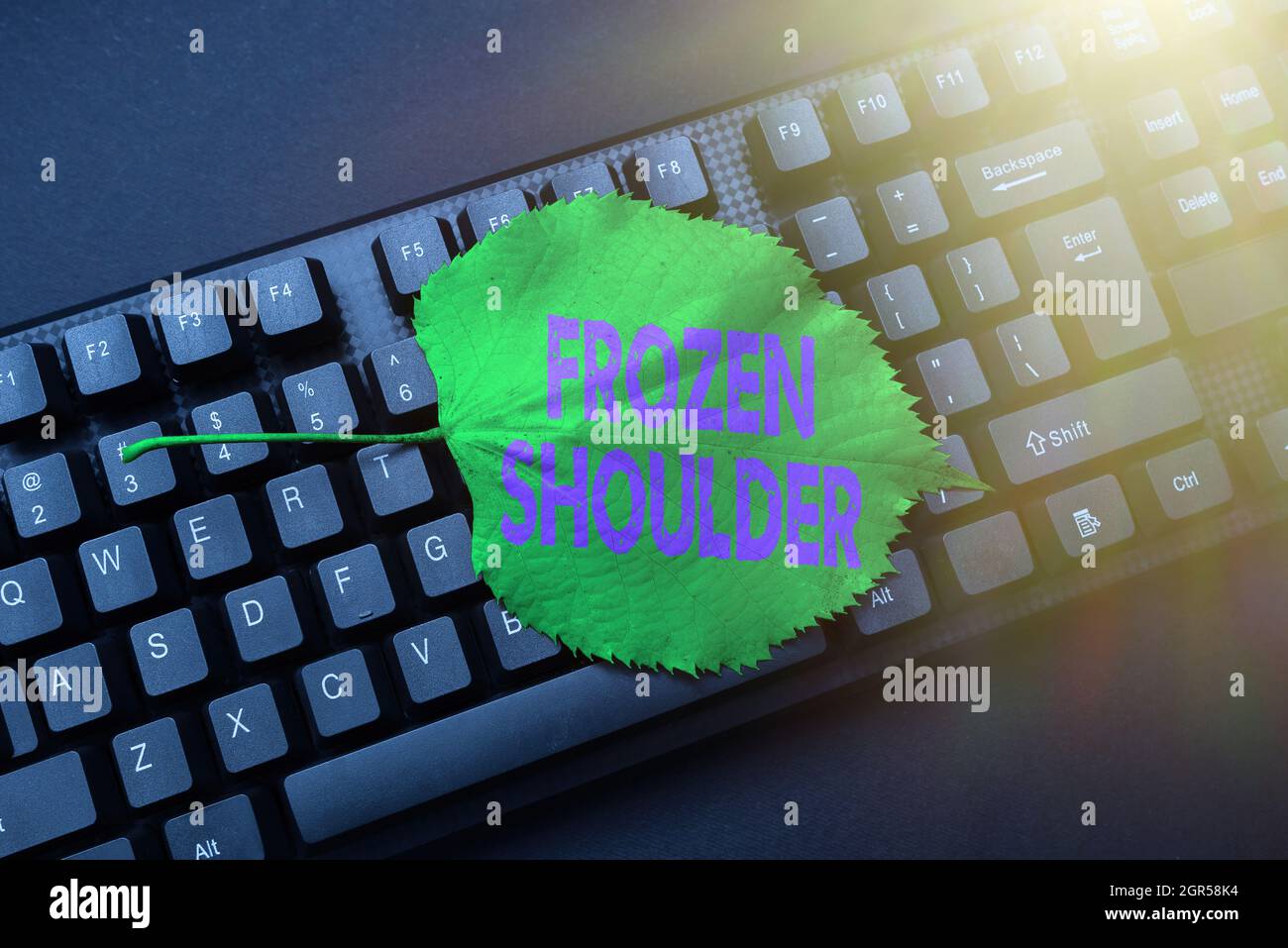 Hand writing sign Frozen Shoulder. Internet Concept characterized by ...