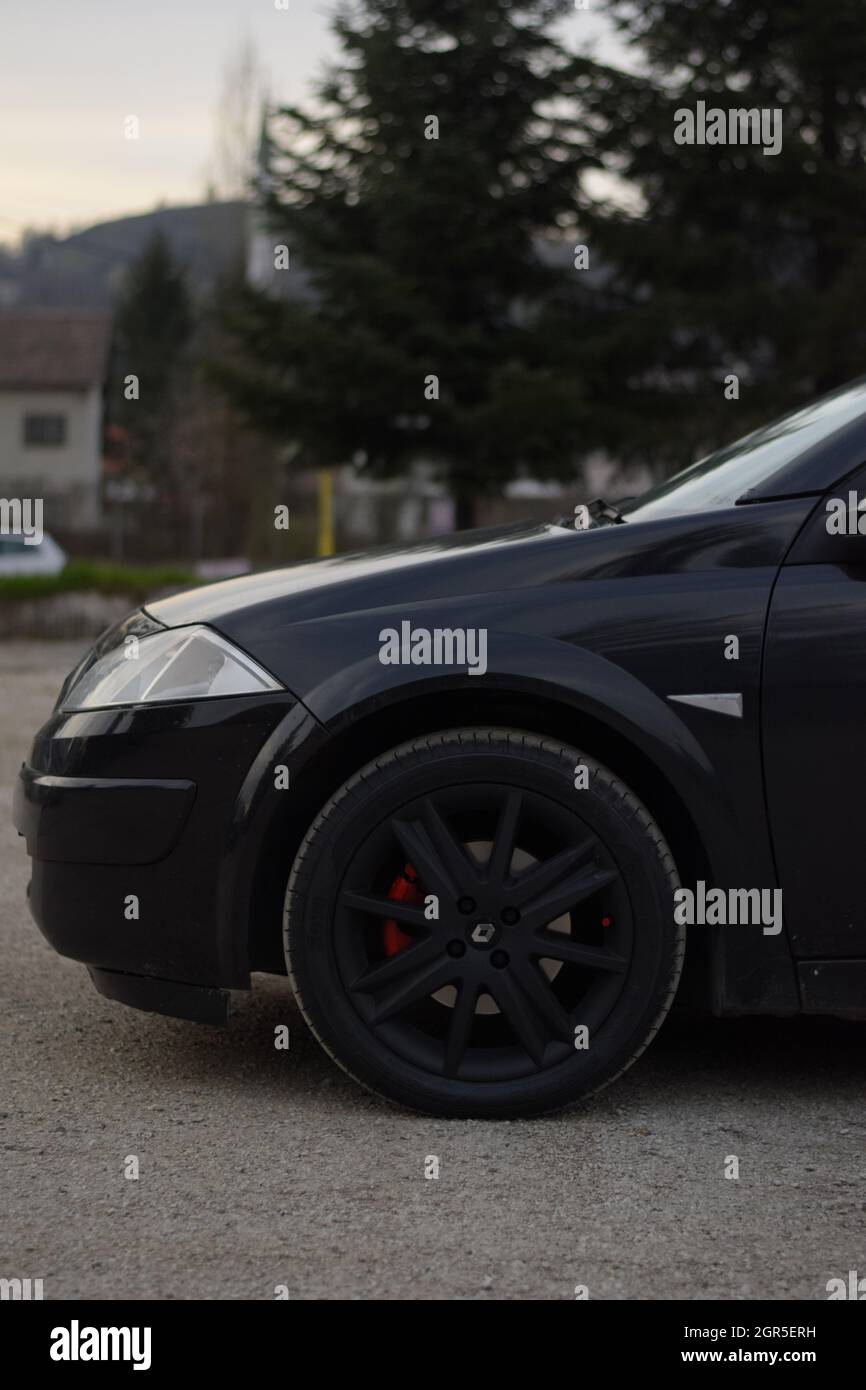 Selective of the front wheel of the blackcar from the side Stock Photo ...