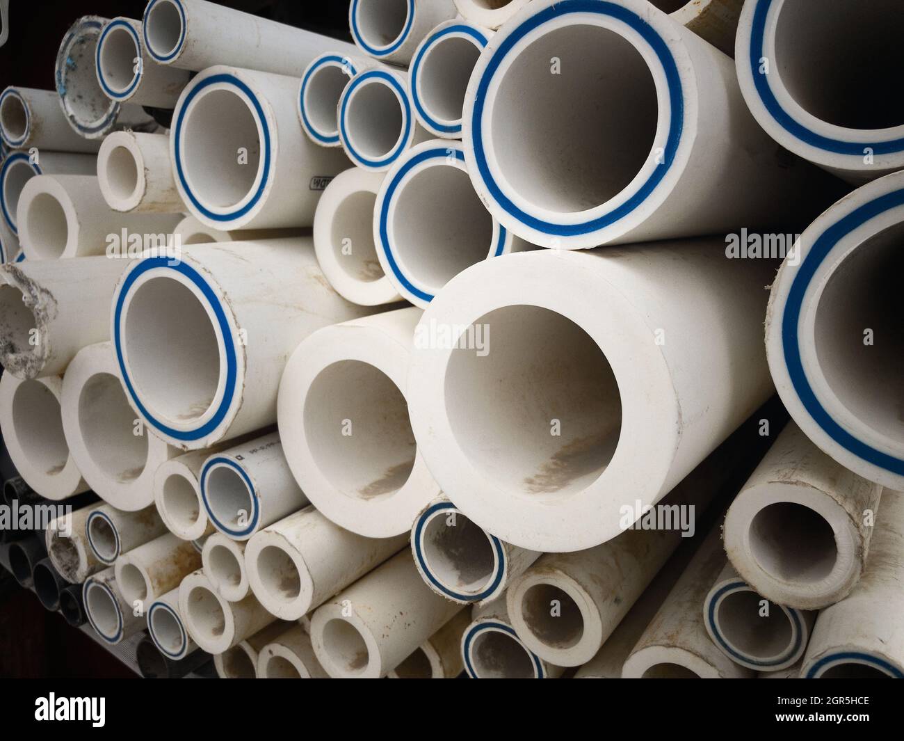 Stacked plastic pipes stacked pvc hi-res stock photography and images ...