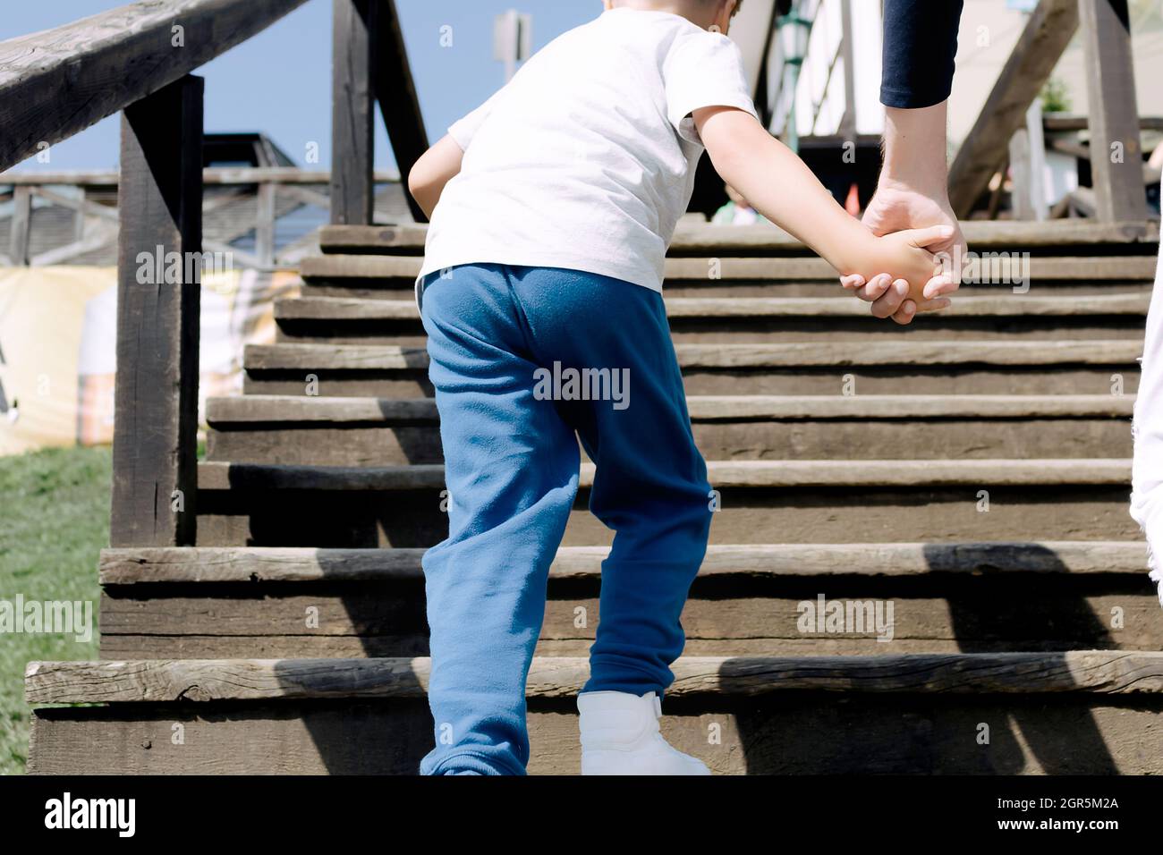 Boy Walking Up Stairs High Resolution Stock Photography and Images - Alamy