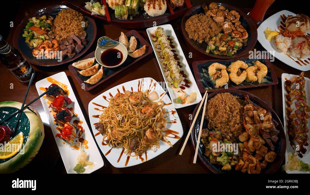 Top view of a rich table with traditional Asian food Stock Photo - Alamy