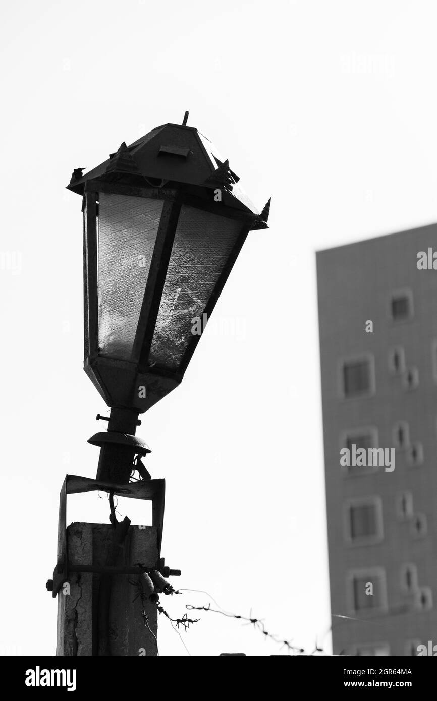 Close up shot of an old electrical light device in a public place, in ...