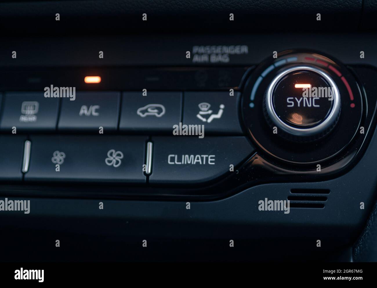 Closeup of a heat control panel of a modern car under the liht Stock ...