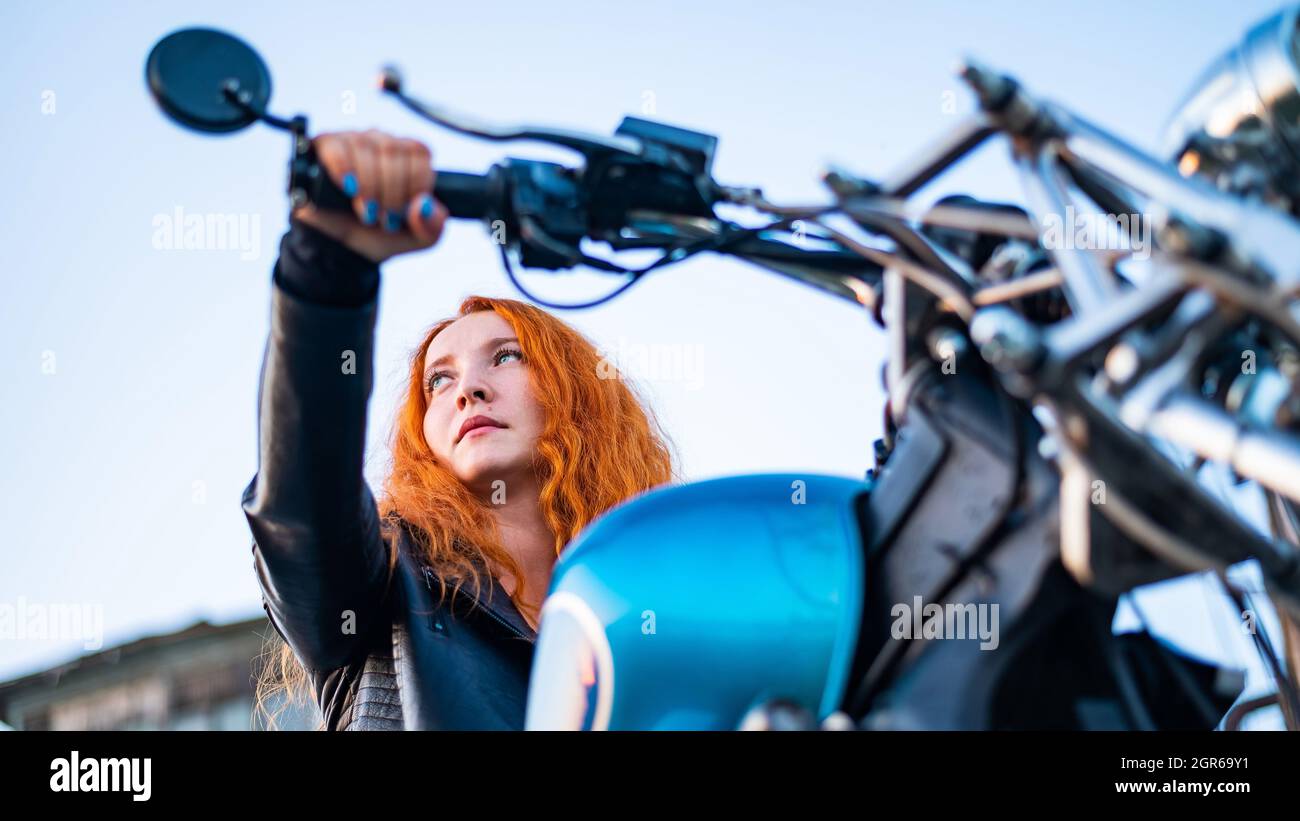 Biker riding motorcycle low angle hi-res stock photography and images ...