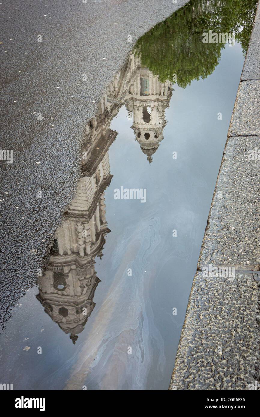 Reflection Of Building In Puddle Stock Photo - Alamy