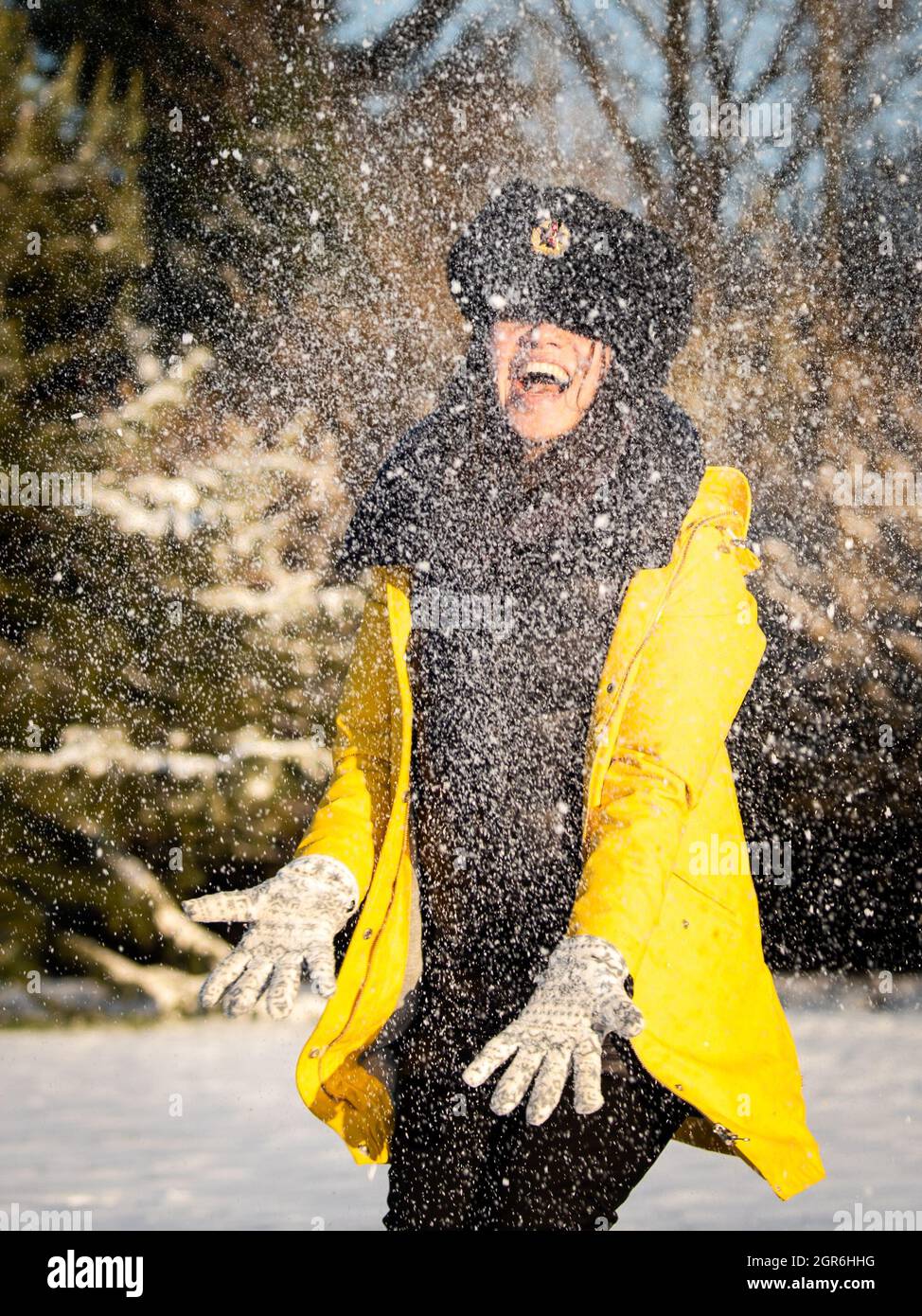 Real woman in yellow coat hi-res stock photography and images - Alamy