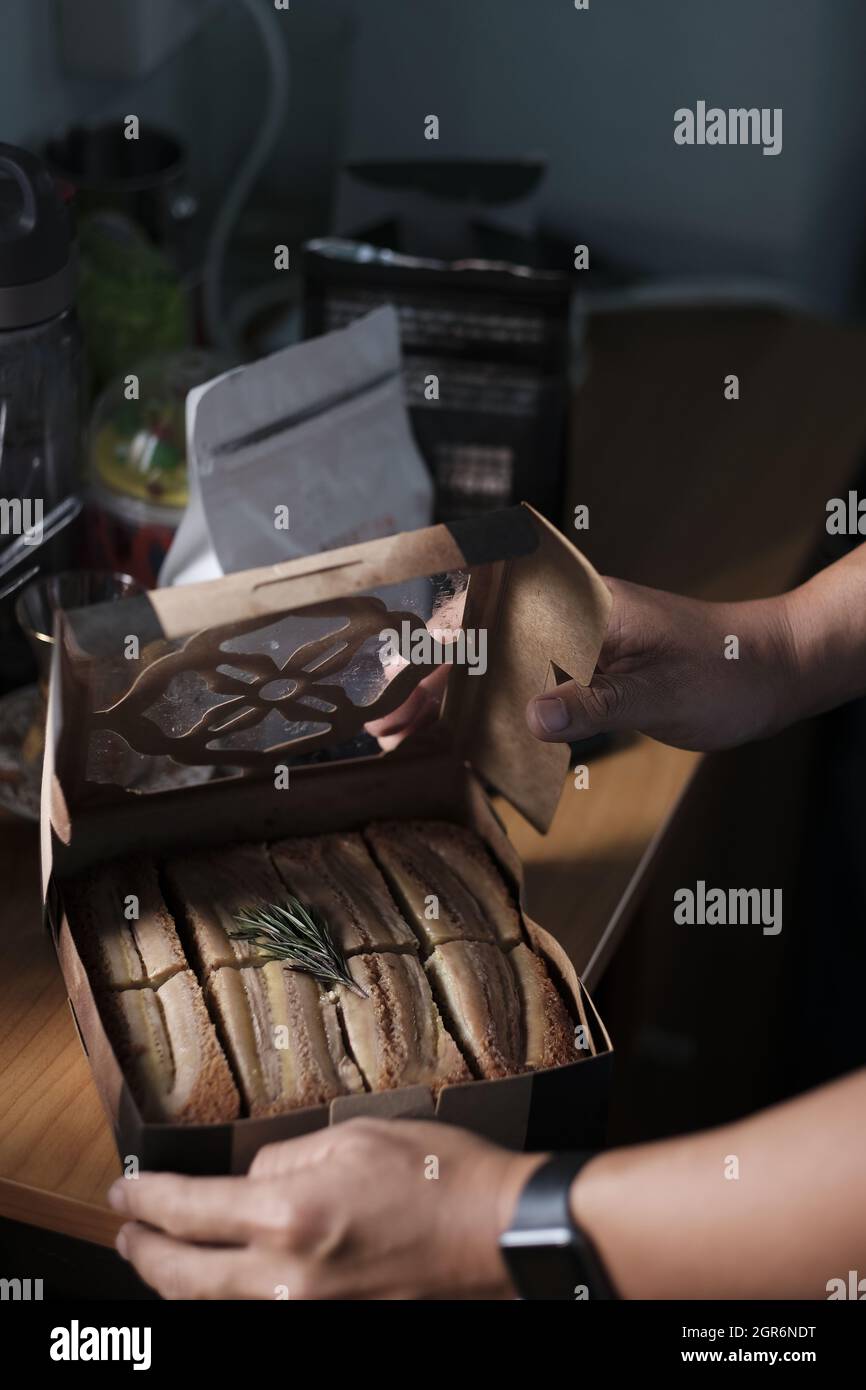 Human hands opening box hi-res stock photography and images - Alamy