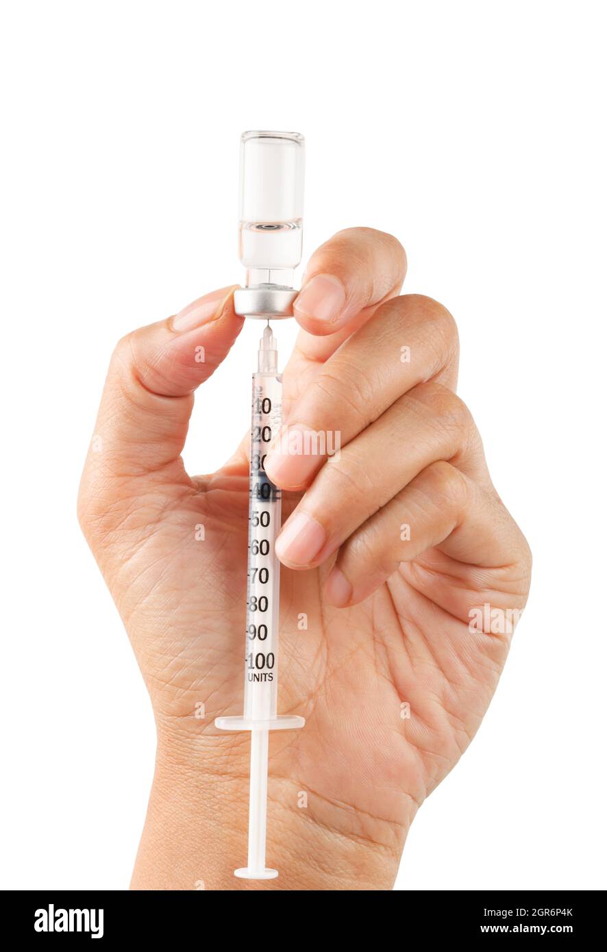 Syringe, medical injection vaccination in hand isolated on white ...