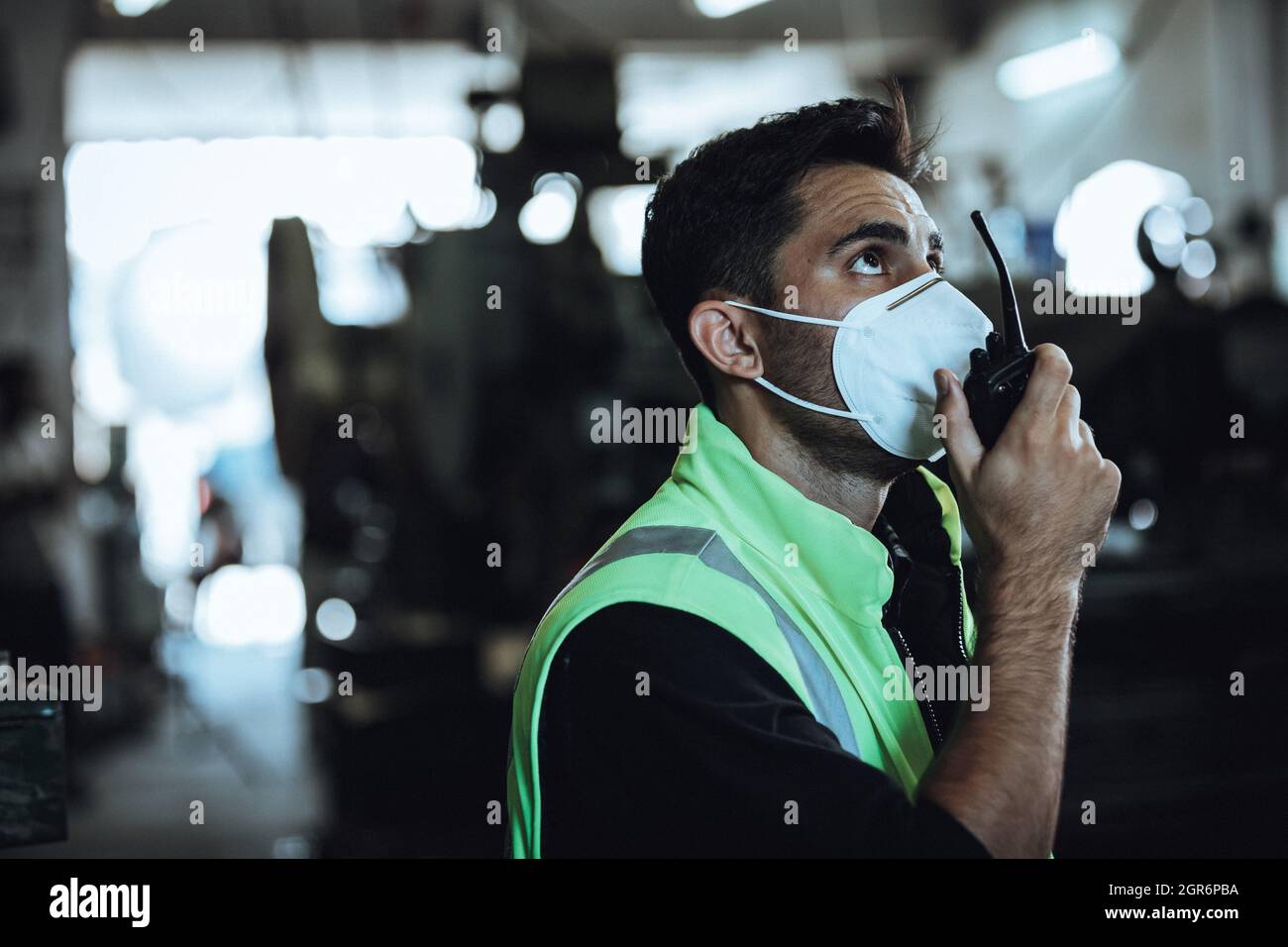 Indian construction worker wearing mask hi-res stock photography and ...