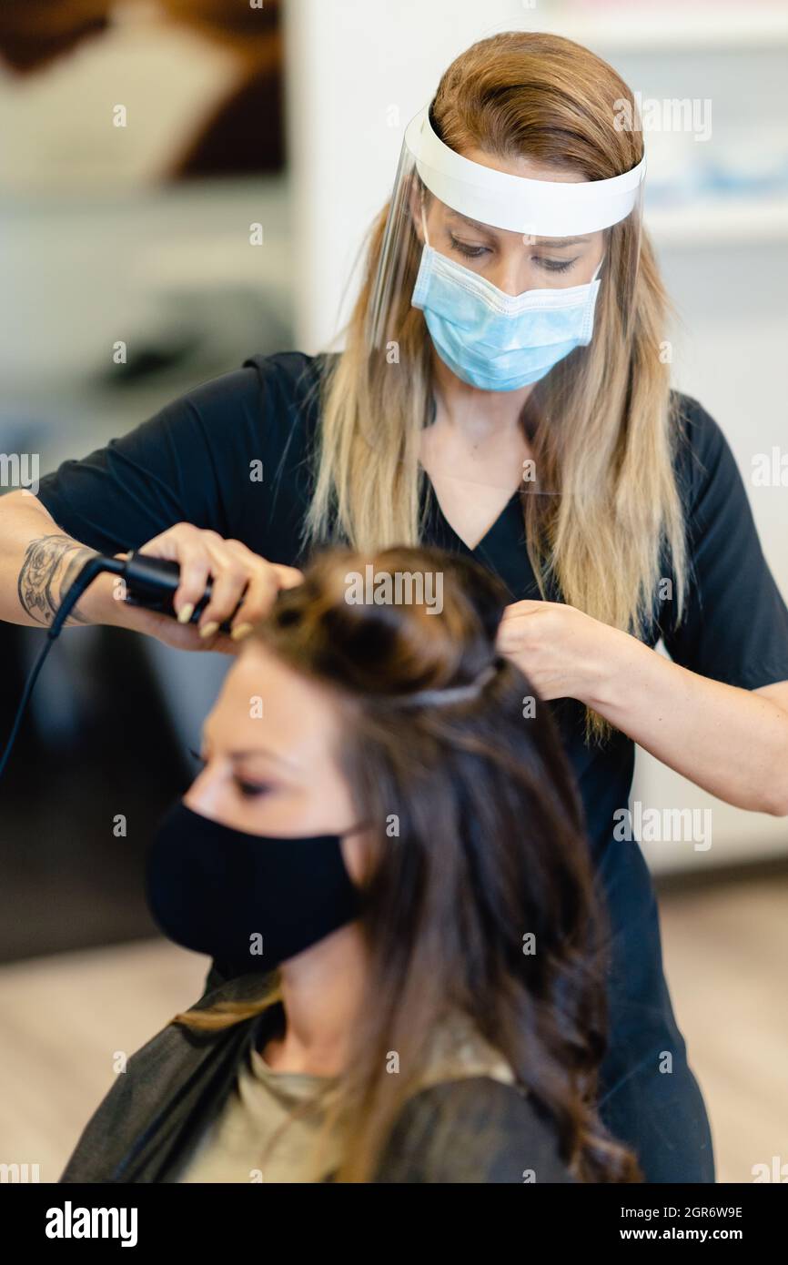 Hairdresser face shield hi-res stock photography and images - Alamy