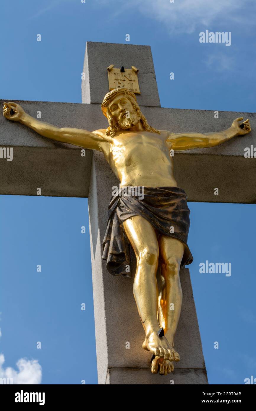 Golden crucified Jesus Christ on the cross. Close up. Detail. Nitra ...