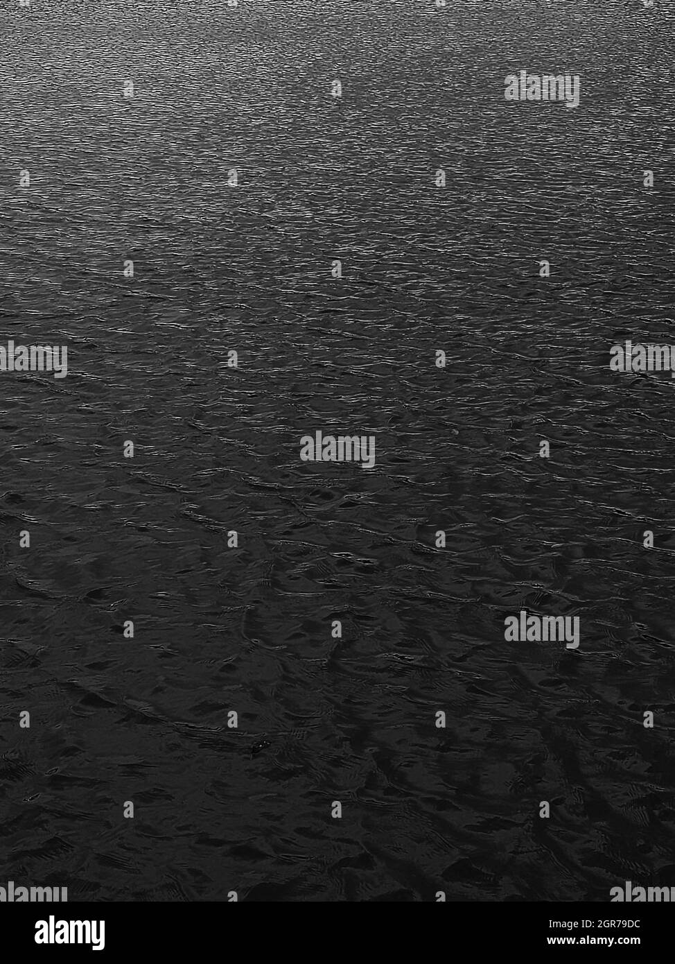 Black water surface. dark water texture background Stock Photo - Alamy