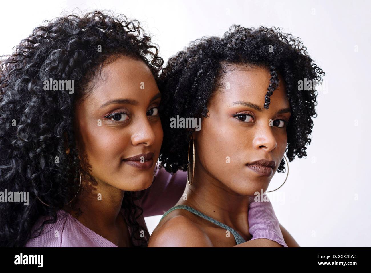 Two Black Women Hugging Each Other High Resolution Stock Photography ...