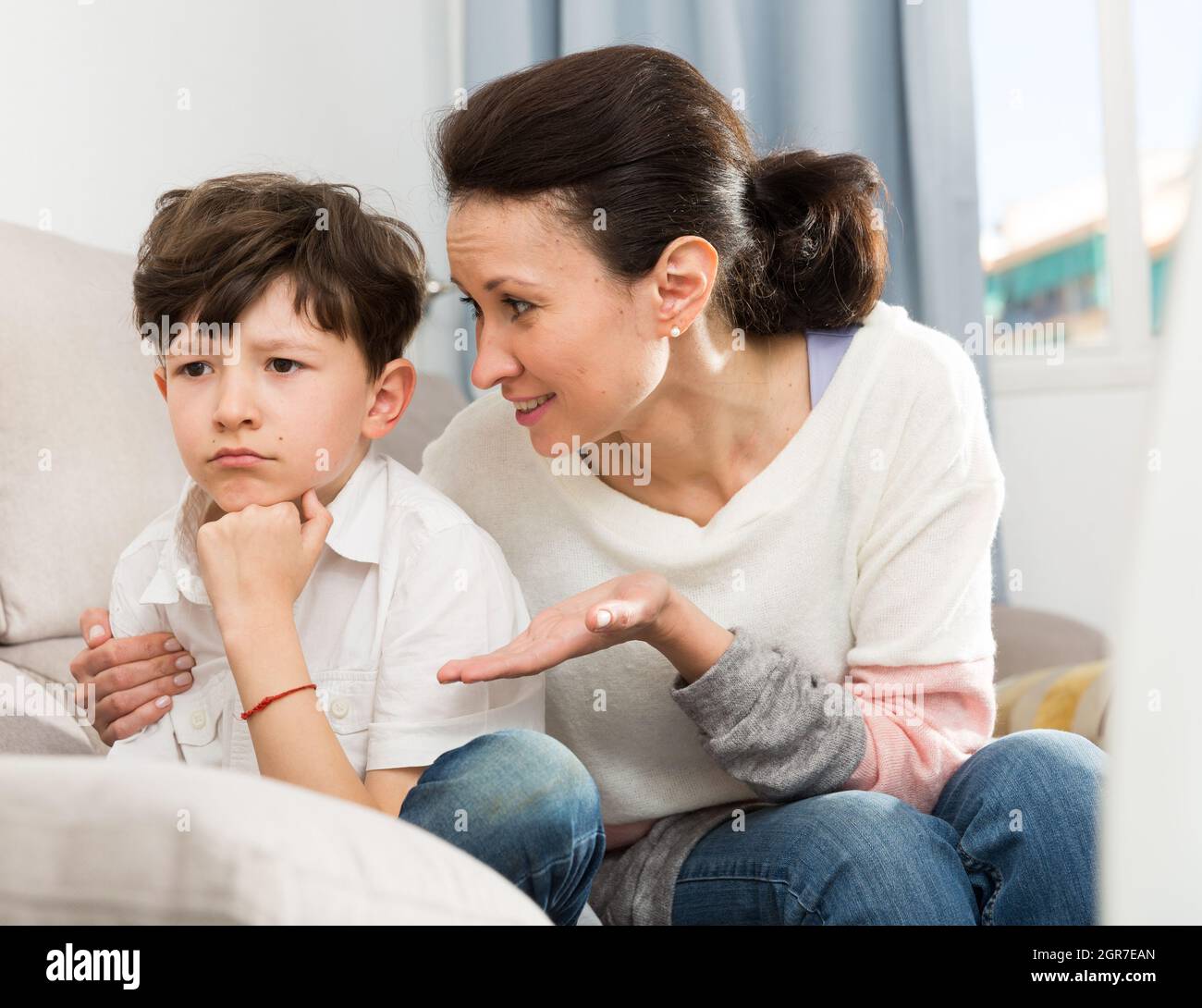 Mom soothing offended tweenager Stock Photo - Alamy Mom soothing offended tweenager Stock Photo - Alamy