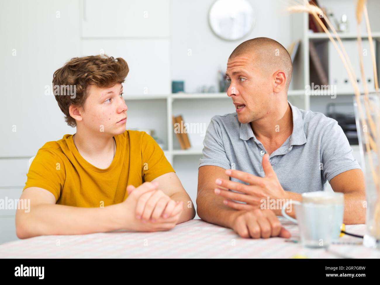 Emotional teen talking with parent hi-res stock photography and images ...