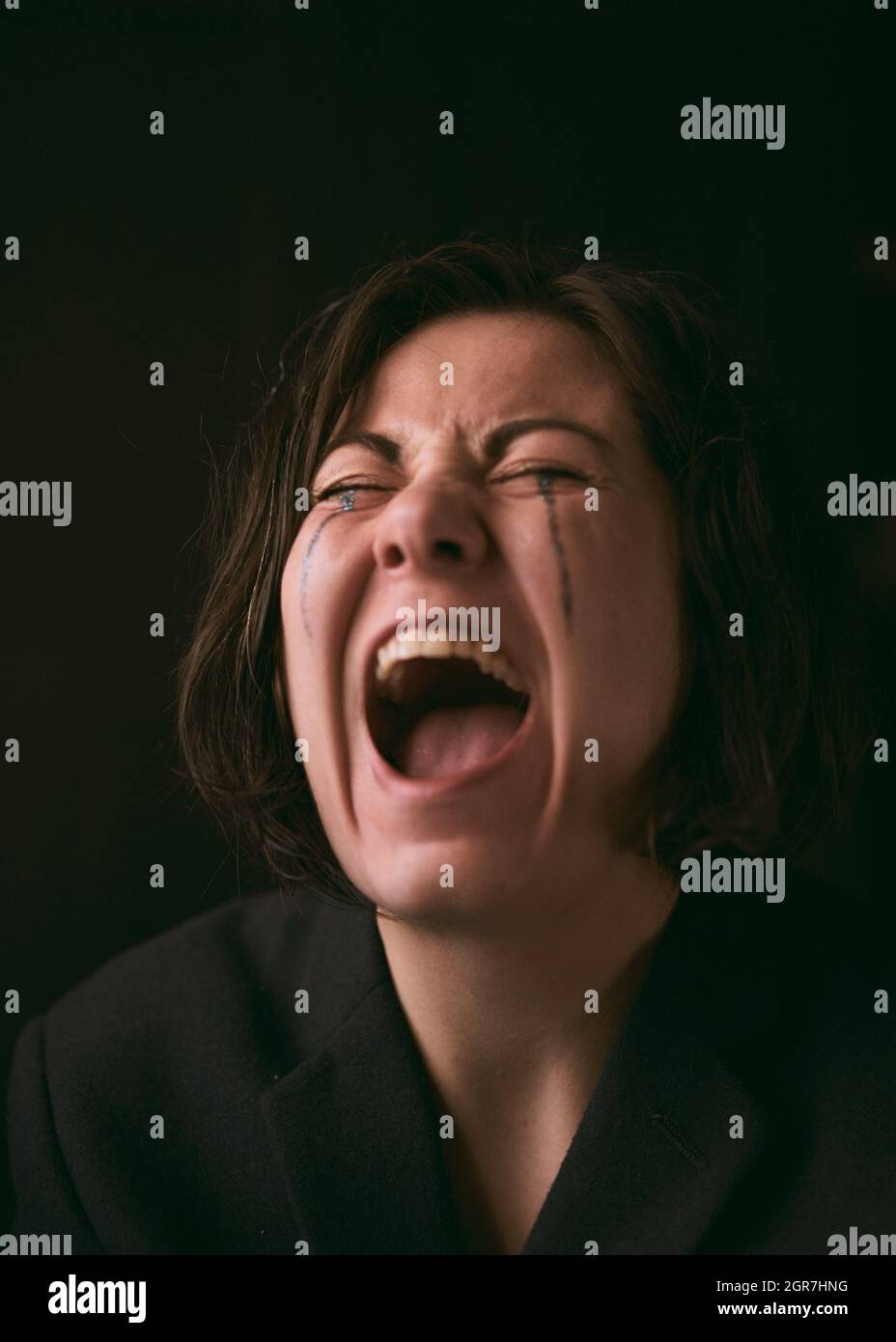 Eyes open fear woman close up crying hi-res stock photography and ...