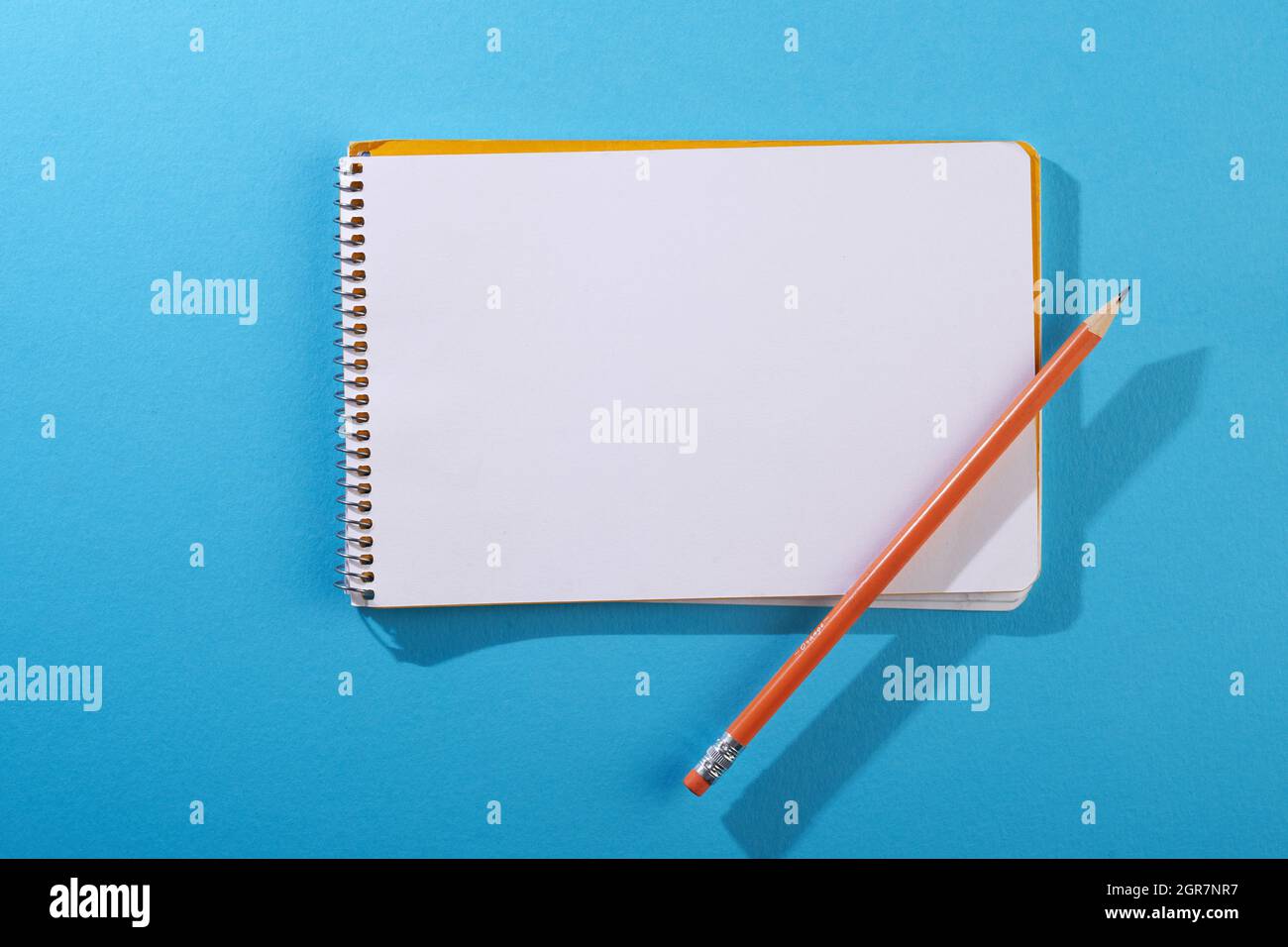 Blank Empty Sketch Book With Pencil On The Blue Background Stock Photo ...