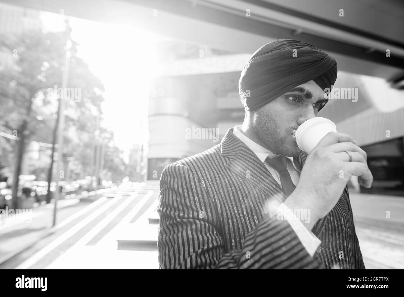 Indian man with cup Black and White Stock Photos & Images - Alamy