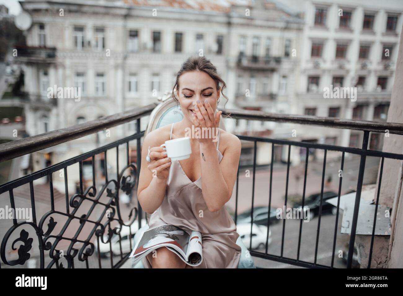 Portrait Of Beautiful Woman Standing Against Railing Stock Photo - Alamy