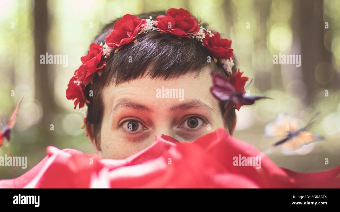 Woman and flower over eye beauty hi-res stock photography and images ...