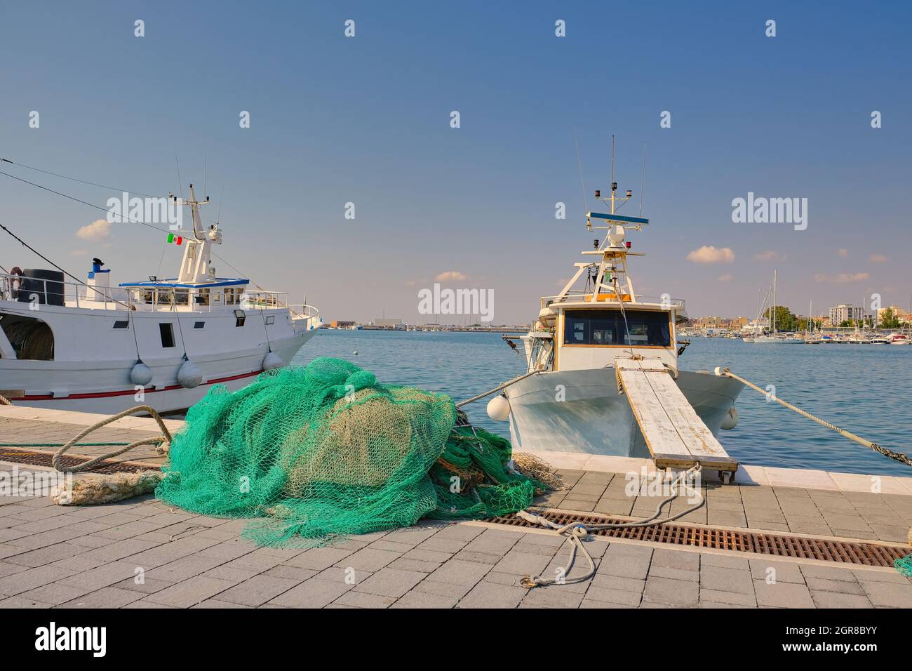 Fishing boats berth in hi-res stock photography and images - Alamy