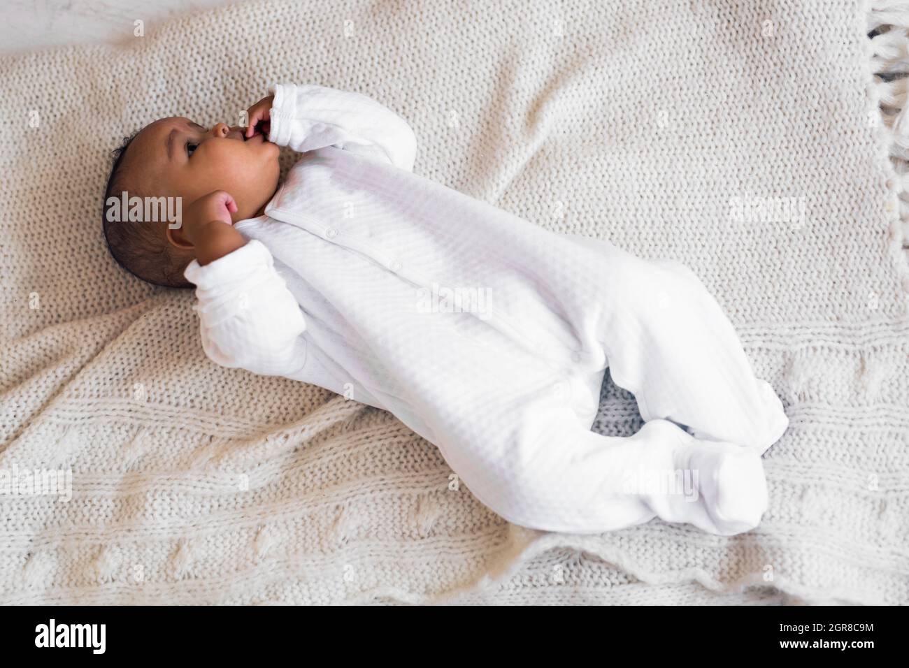 Baby sleeping on back african hi-res stock photography and images - Alamy