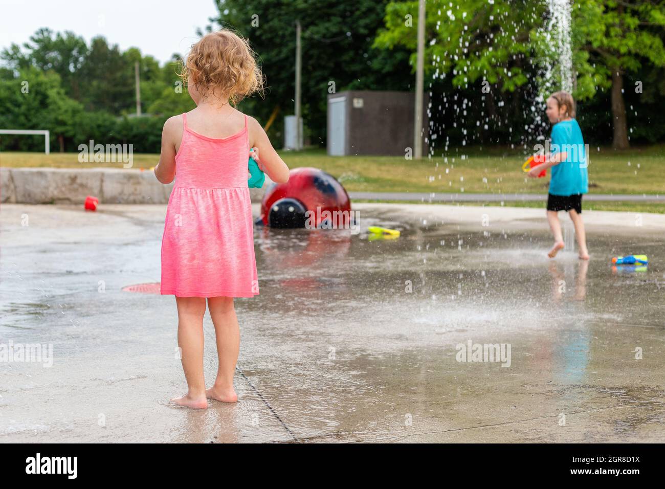 Children Playing Splash Pad High Resolution Stock Photography and ...