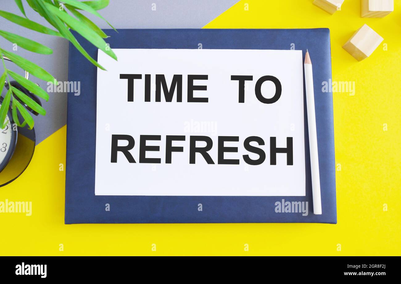 TIME TO REFRESH text written in Notebook, bsiness concept, yellow ...