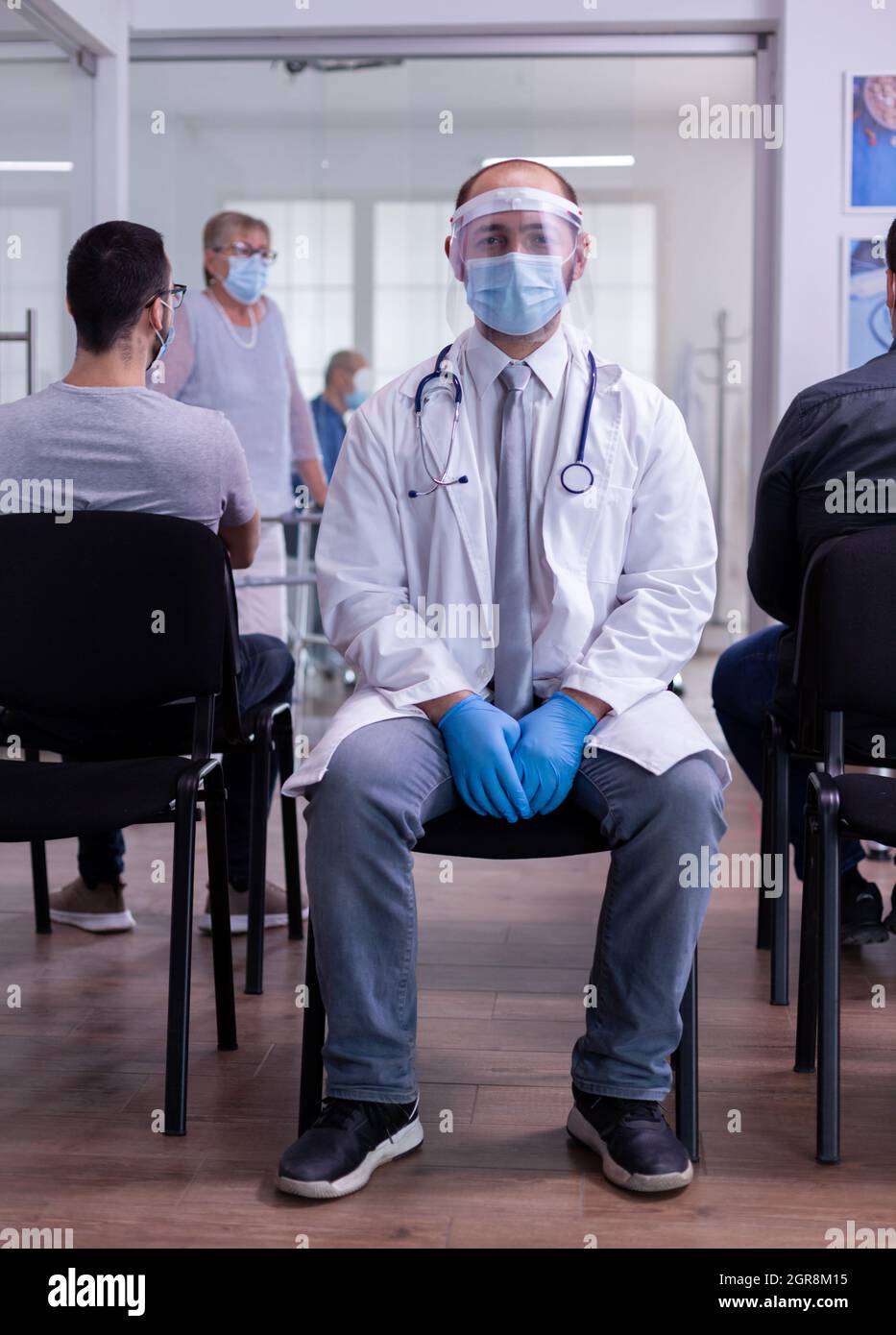 People Sitting On Chair Stock Photo - Alamy