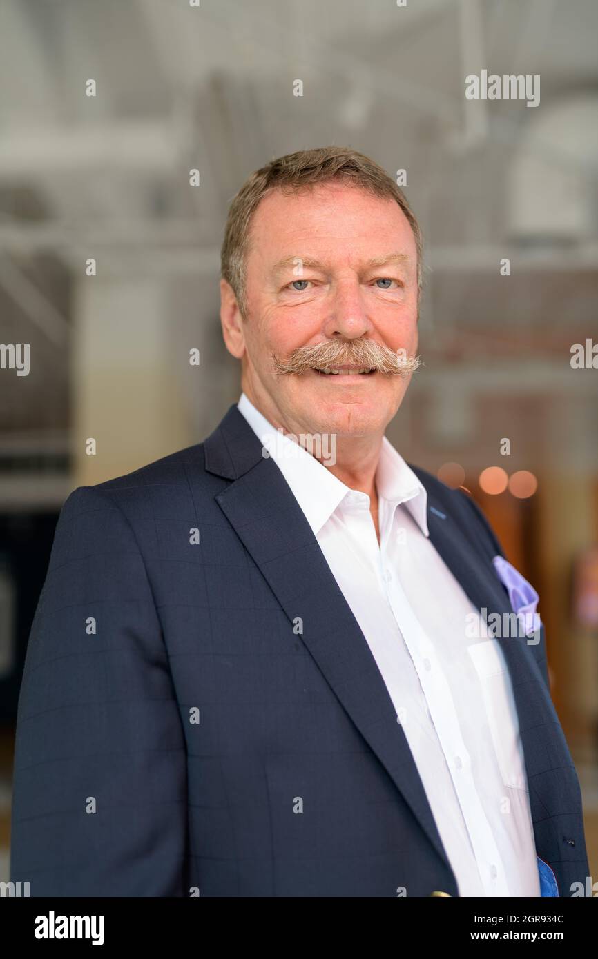 Portrait Of Senior Man Wearing Suit Stock Photo - Alamy