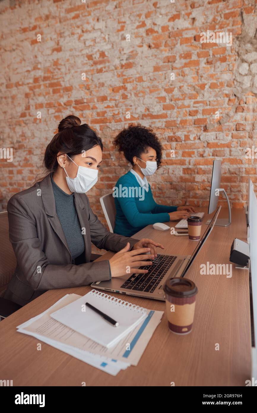 Two People Using Computer Stock Photo - Alamy
