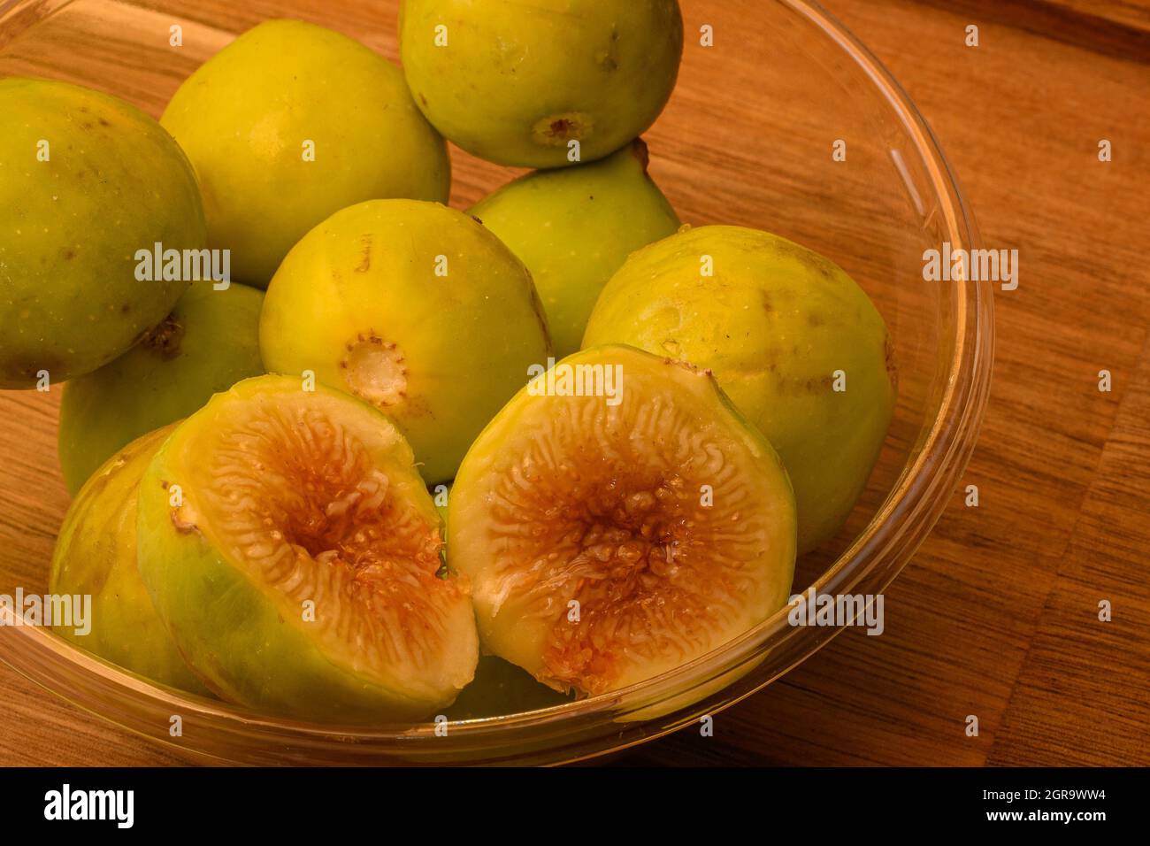 Fresh Figs In A Transparent Bowl Stock Photo - Alamy
