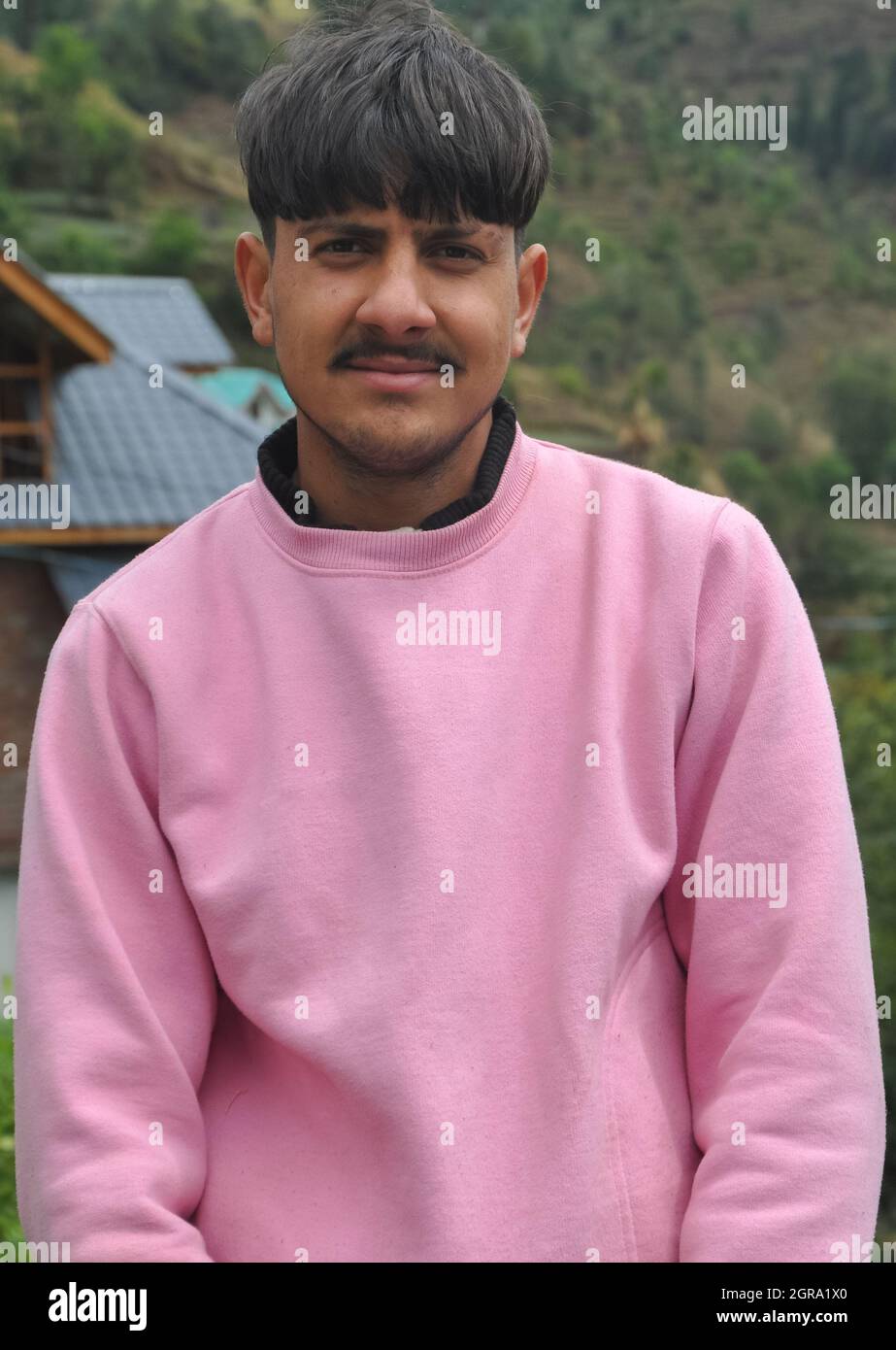 Good looking young indian guy hi-res stock photography and images - Alamy