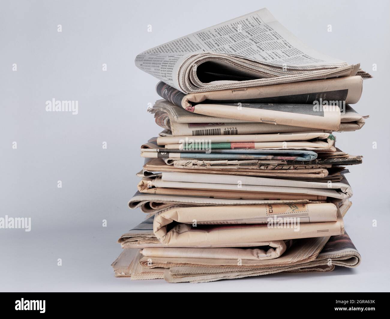 Pile of newspapers on white background. Journalist, isolated ...