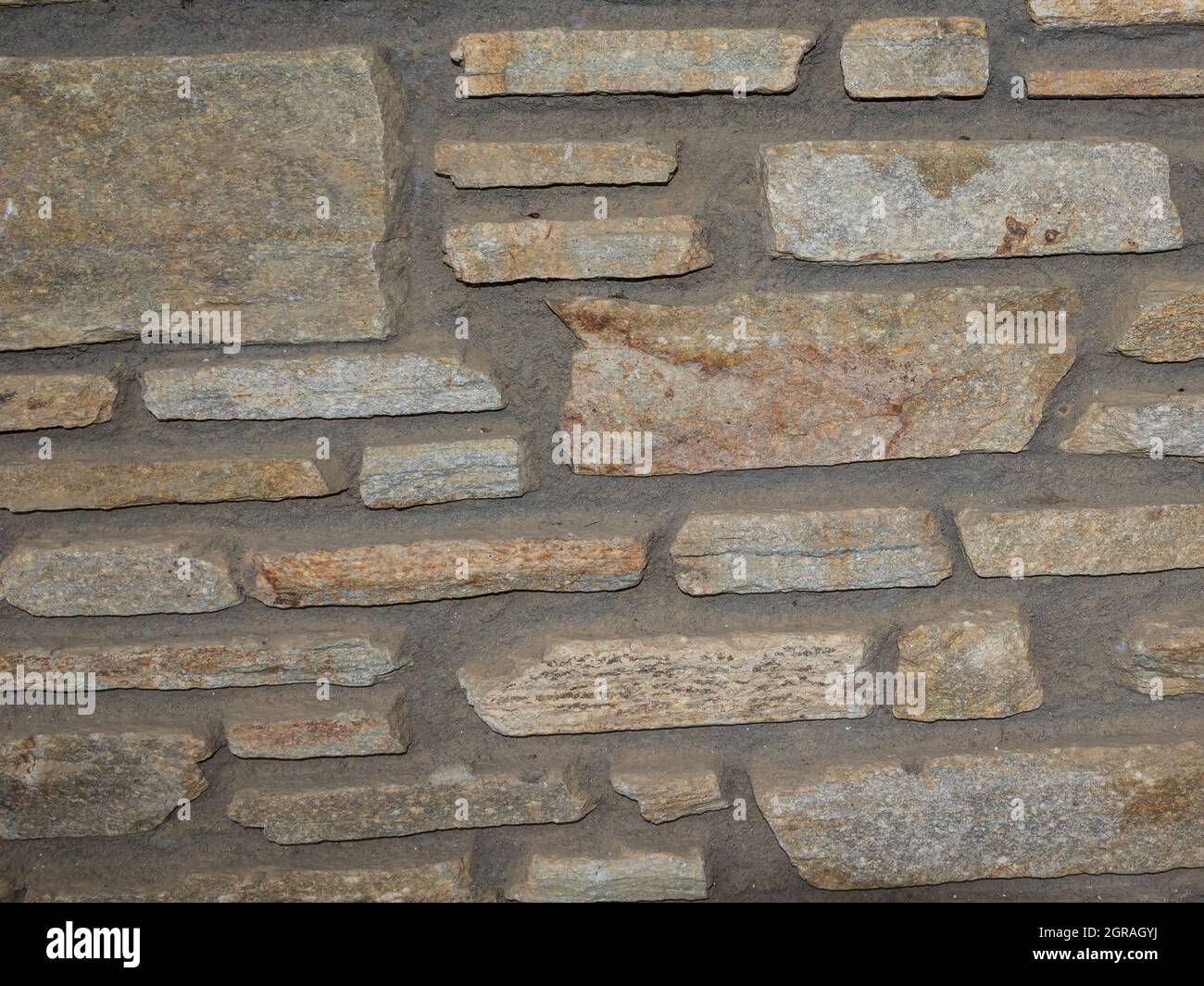 rustic wall of uneven stones Stock Photo - Alamy