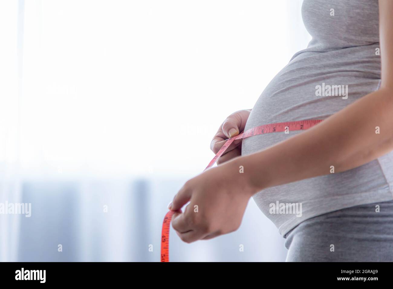 Weight check pregnant woman hi-res stock photography and images - Alamy
