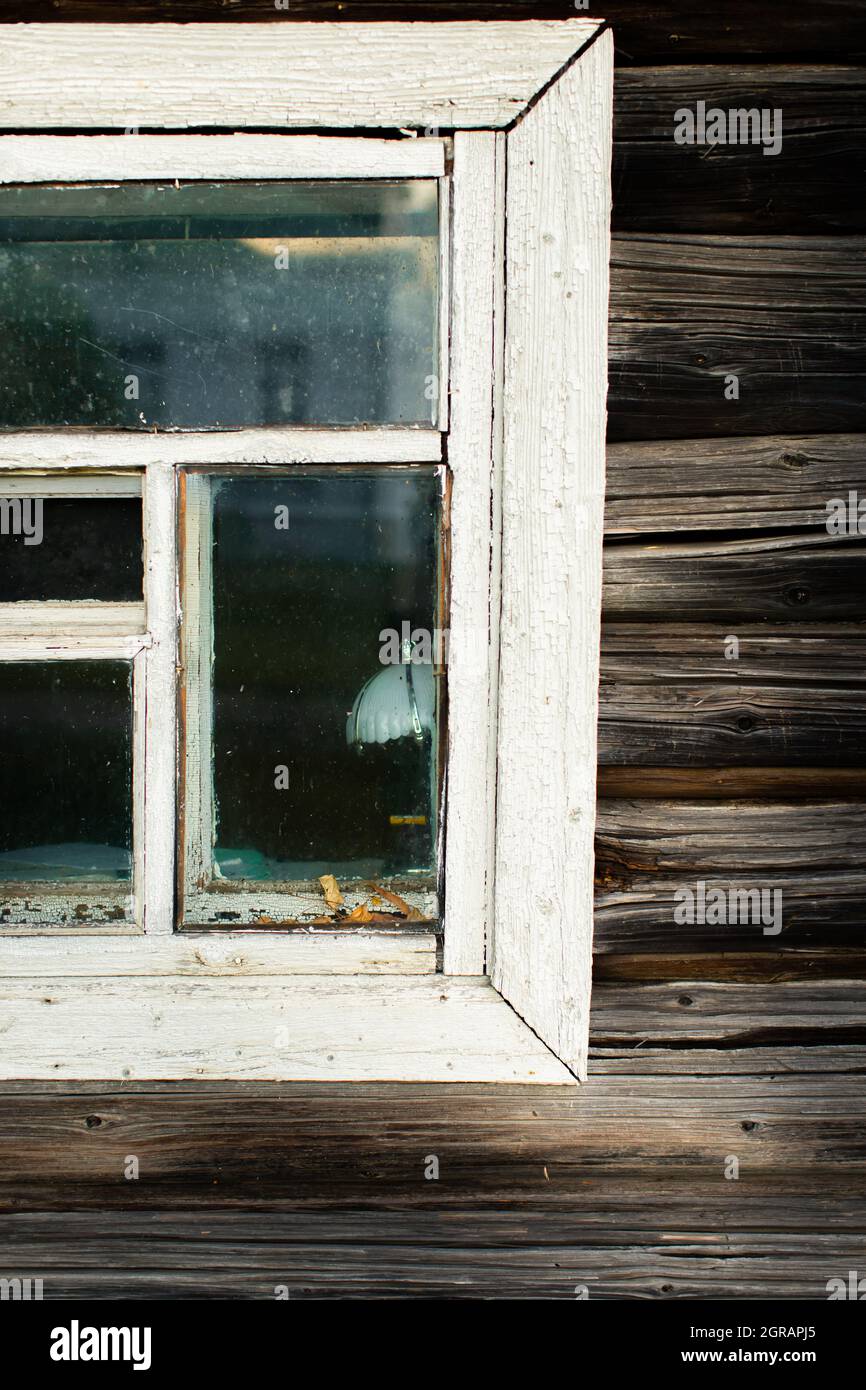 Wooden window in a wooden house in the village Stock Photo - Alamy
