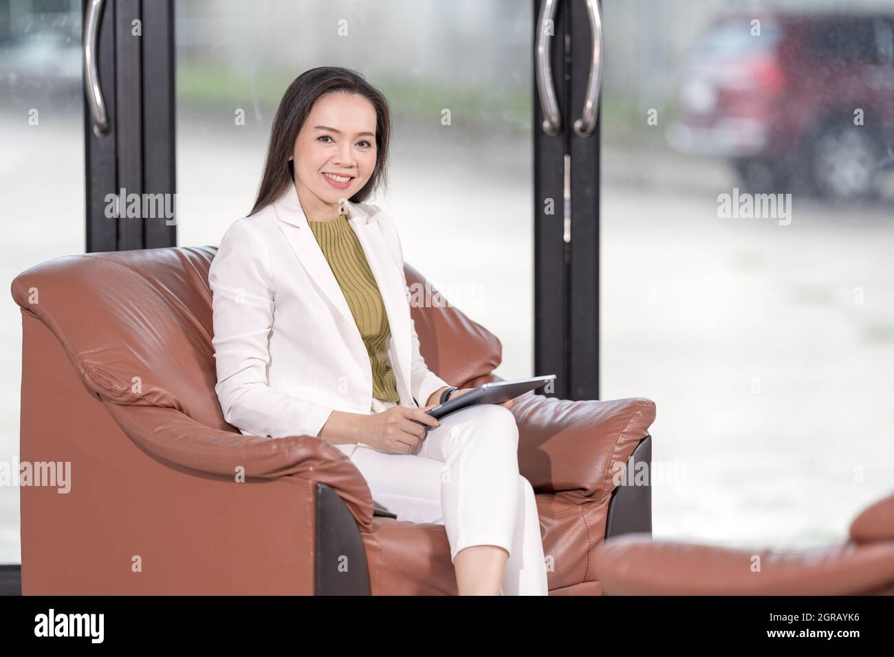 Female Southeast Asian psychologist doctor consults in a psychotherapy ...