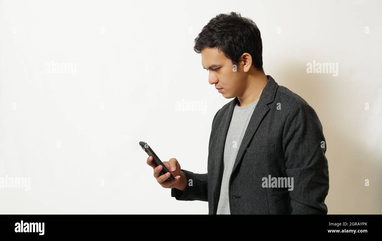 Man Looking At Cell Phone Stock Photo - Alamy