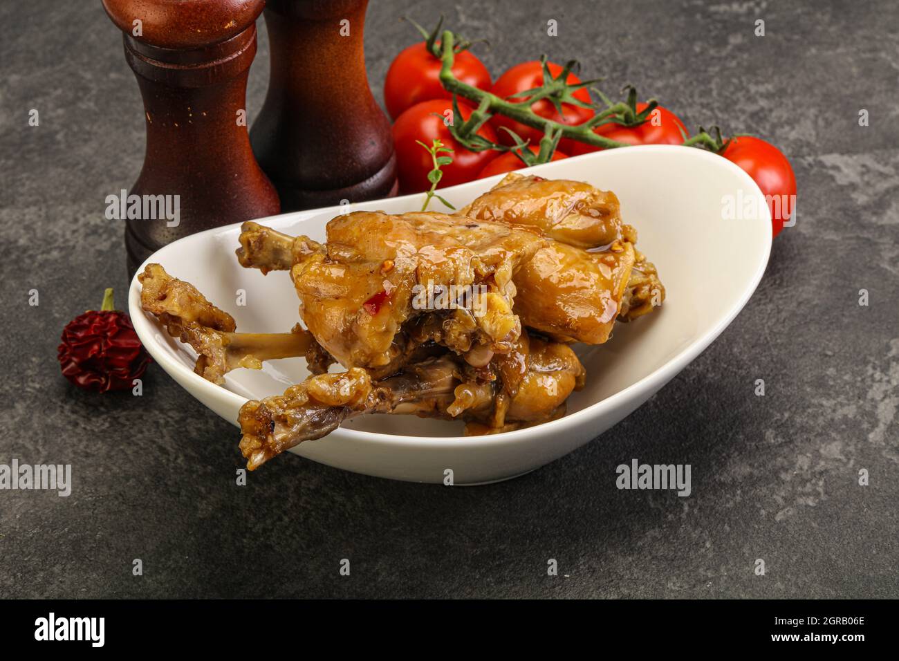 Rabbit stew in sweet and spicy sauce Stock Photo - Alamy