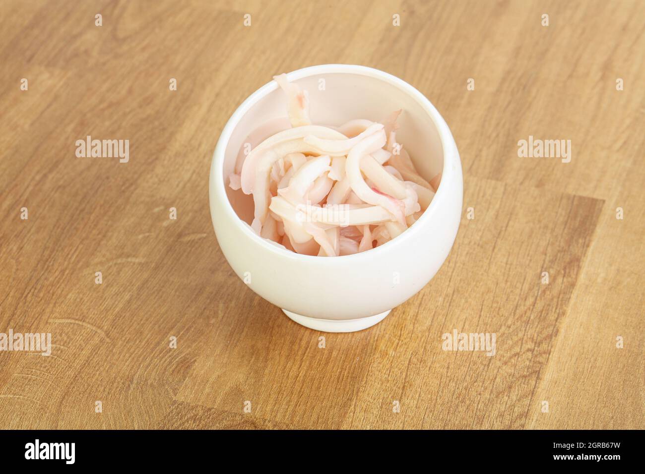 Marinated squid strips snack in the bowl Stock Photo - Alamy